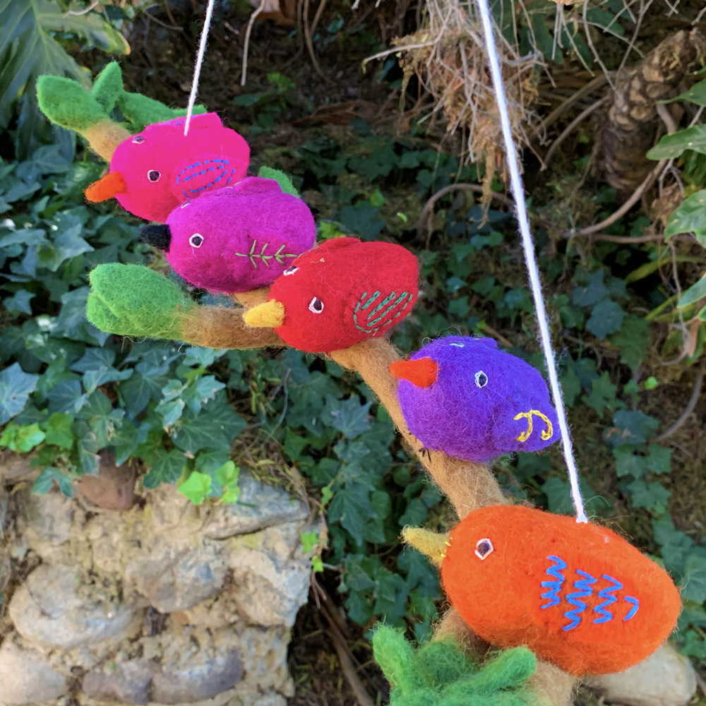 Felted wool birds on a branch